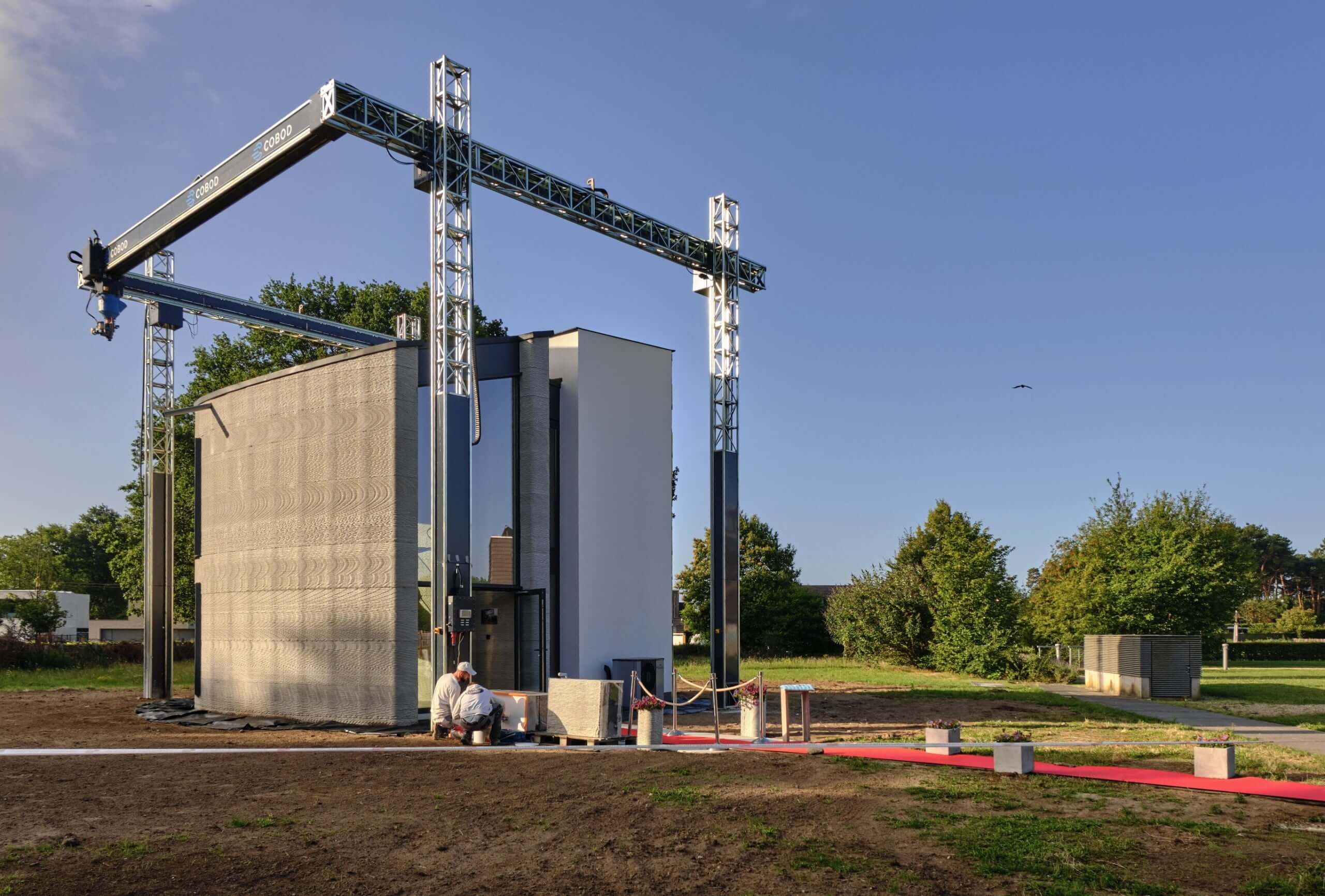 Largest 3D Printer in Europe Builds 2-Story House - Blue Door Media LLC